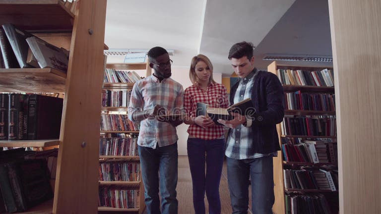 People Discussing the Books Stock Image - Image of interior, indoors ...