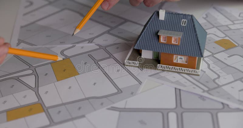 People Discussing and Choosing Building Plot for House Construction on ...