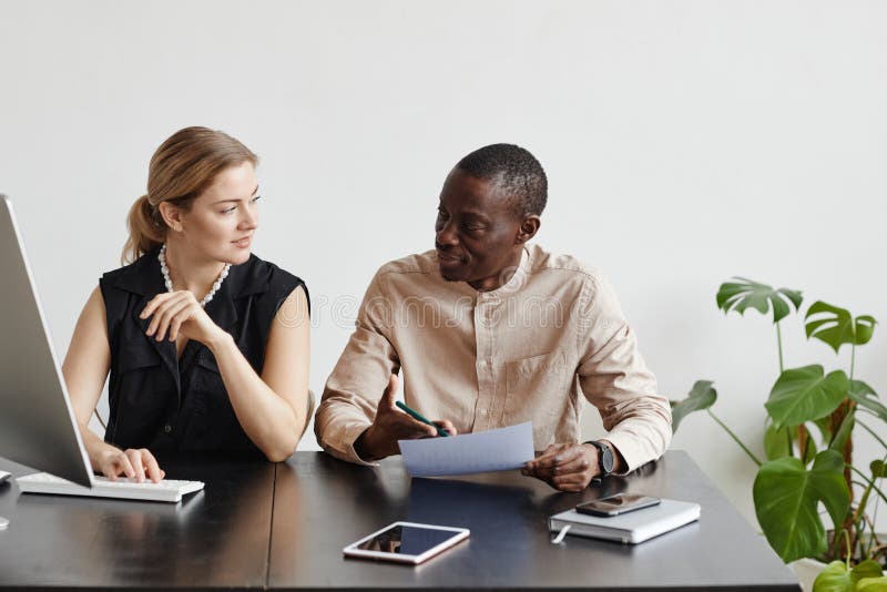 People Discussing Project stock image. Image of workplace - 233998131