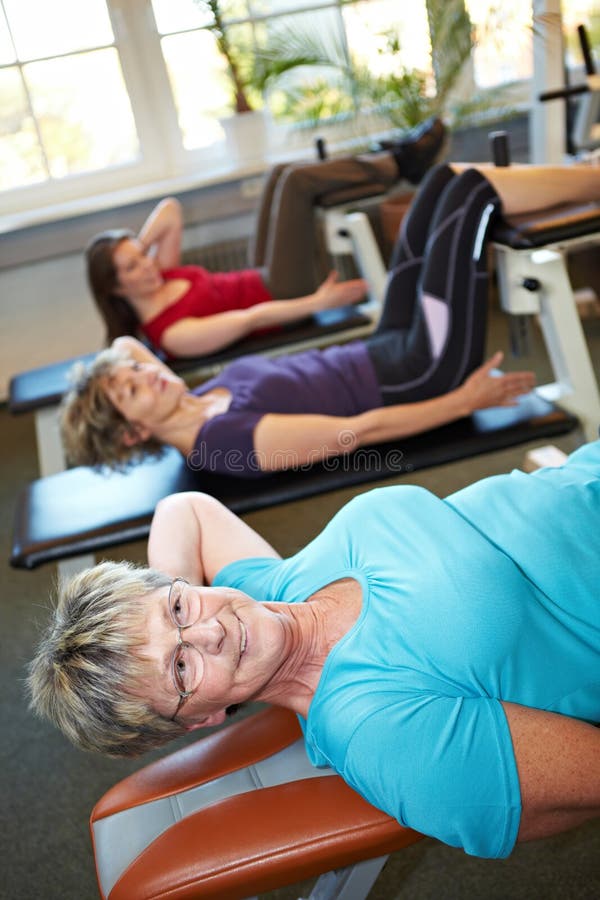 People Doing Crunches in Gym Stock Photo - Image of power, fitness ...