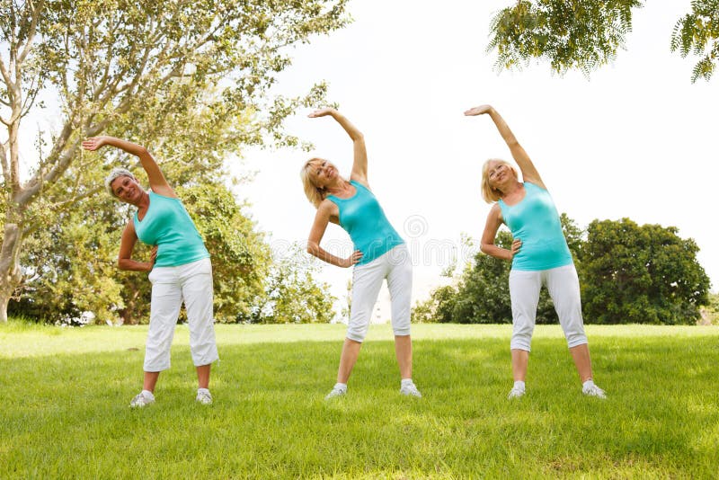 People Doing Flexibility Exercises Stock Photo - Image of casual ...