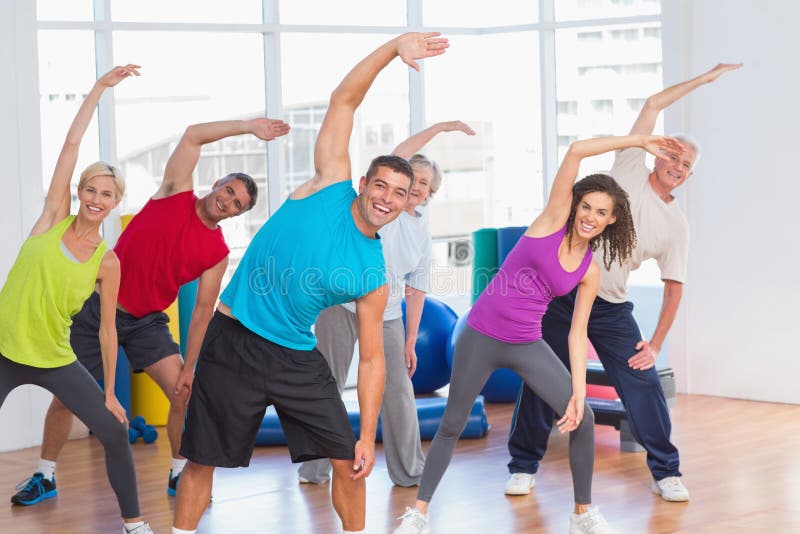 People Doing Stretching Exercise in Gym Stock Image - Image of ...