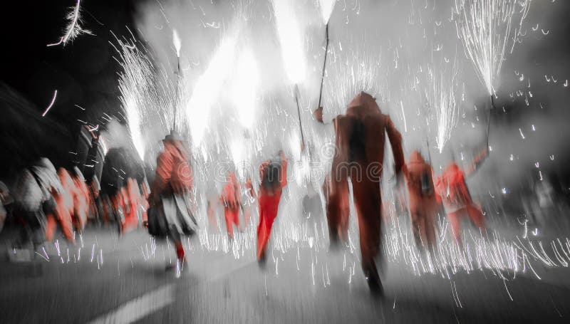 People Dressed As Devils Playing with Pyrotechnics Stock Image - Image ...