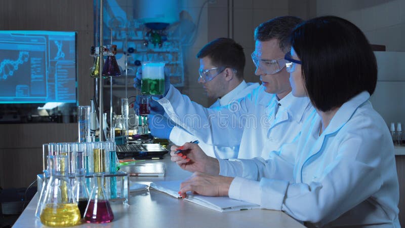 People Dripping Chemical in Plant Stock Photo - Image of horizontal ...