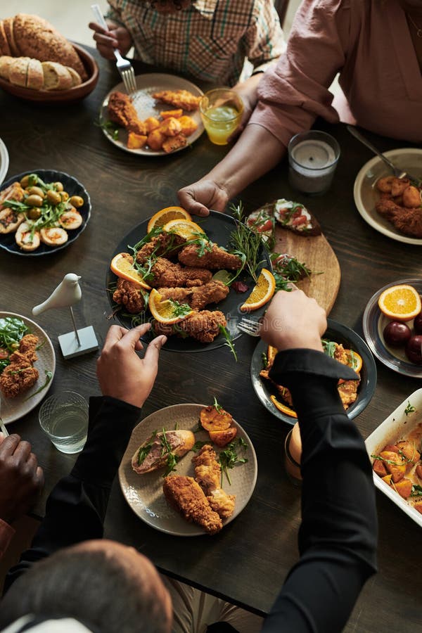 People Eating Chicken at Dining Table Stock Image - Image of lunch ...