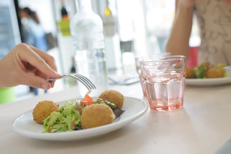 People Eating Healthy Salad at Restaurant Stock Photo - Image of quinoa ...
