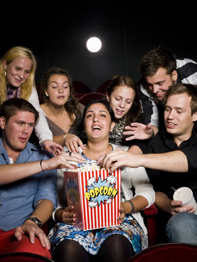 People eating popcorn stock image. Image of humor, performence - 21373953
