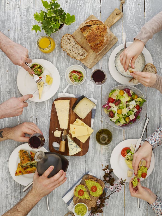 People Eating Table Stock Photos - Download 85,547 Royalty Free Photos