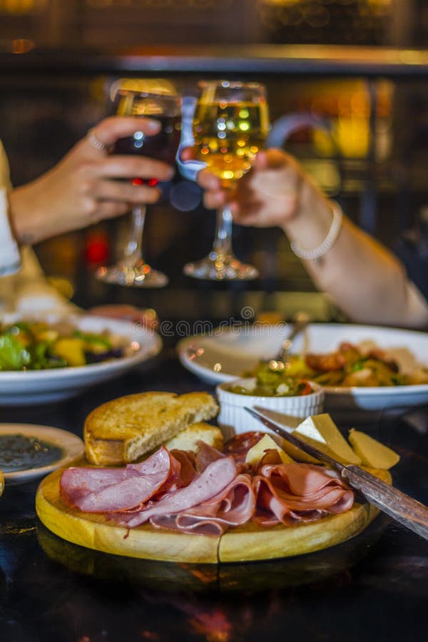 Cheers at a restaurant stock photo. Image of dining - 106405128