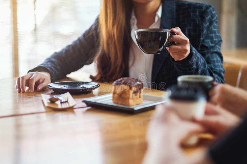 People Enjoyed Talking, Eating and Drinking Coffee Together in Cafe ...
