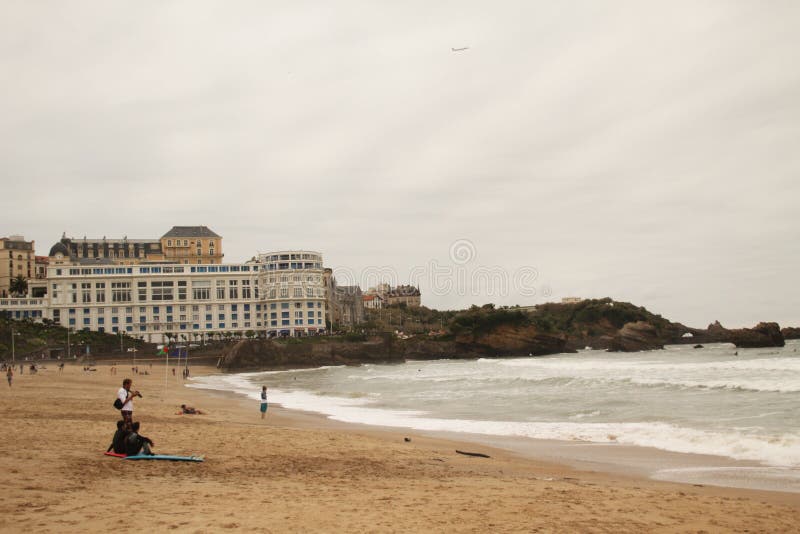 People Enjoying the Beach on a Gloomy Day Editorial Image - Image of ...