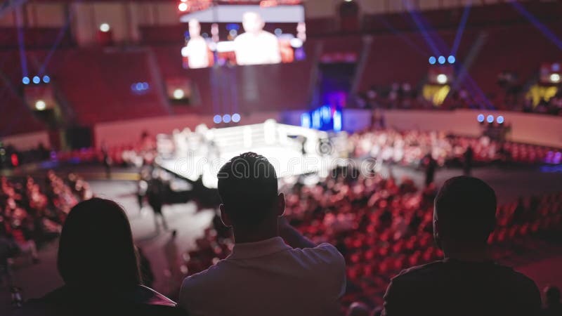 Spectators Watching Competition in Arena from Back Rows Stock Footage ...