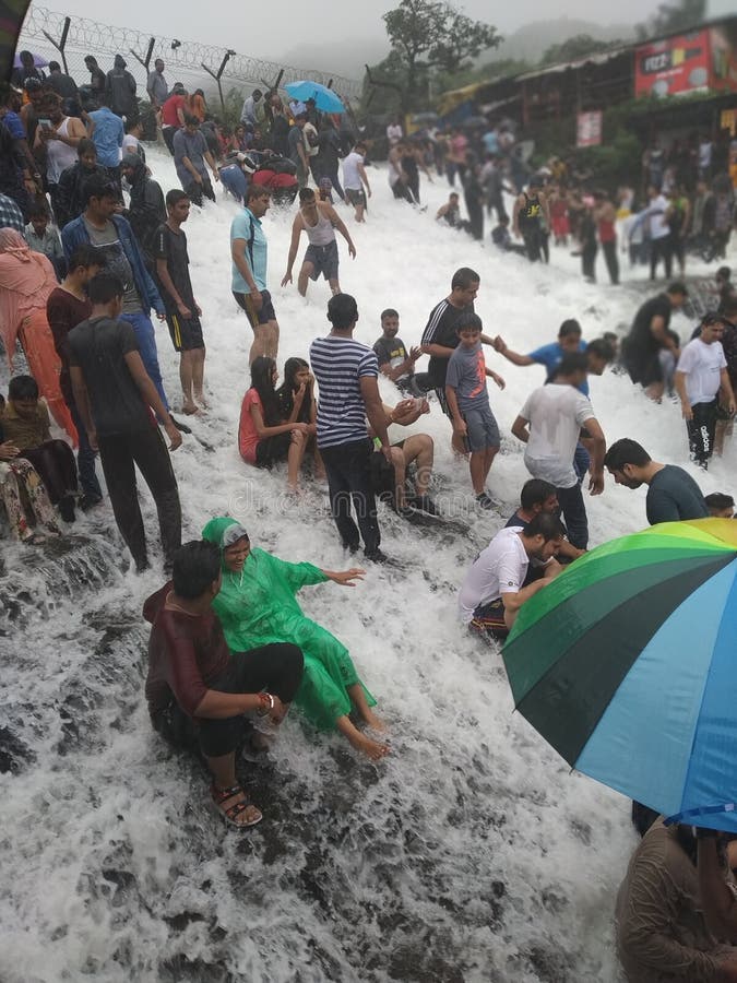 People Enjoying in a Dam Water Fall. Editorial Photo - Image of ...