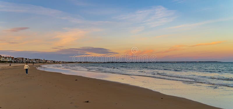 People Enjoying the Evening on the Beach Stock Photo - Image of dusk ...