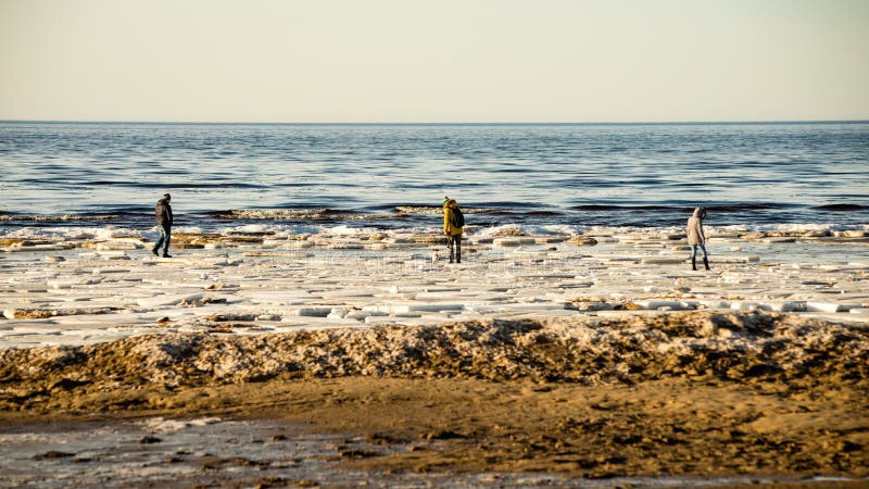 People Enjoying Frozen Beach Stock Photo - Image of background, ocean ...