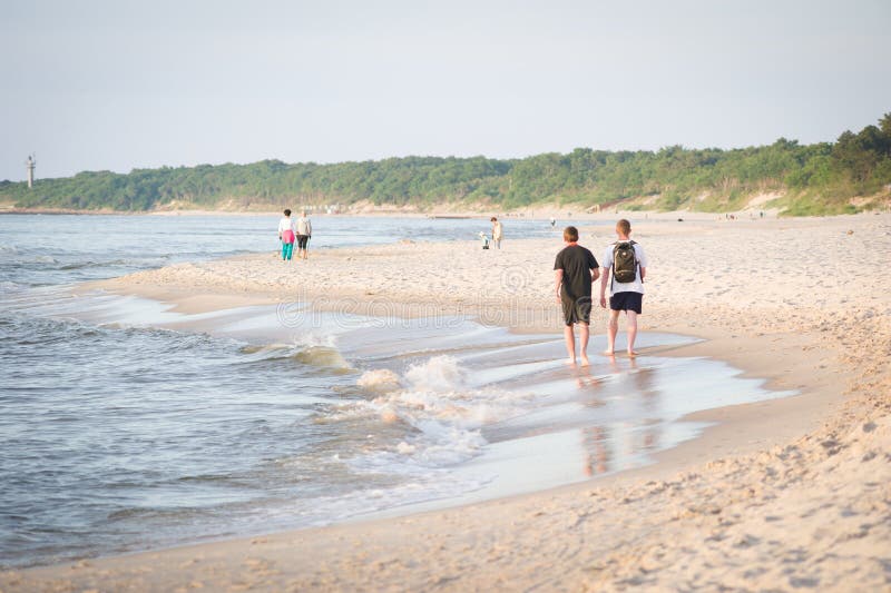 People Enjoying a Sunny Day on a Sandy Beach. Grzybowo Poland Editorial ...