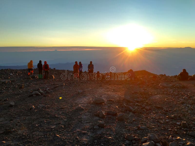 People Enjoying the Sunrise on the Top of Semeru Mountain Stock Image ...
