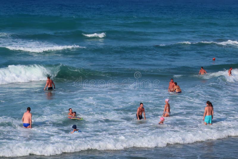 People enjoying waves editorial stock photo. Image of dangerous - 164757783