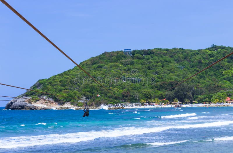 Two people ziplining editorial image. Image of rider - 43646715