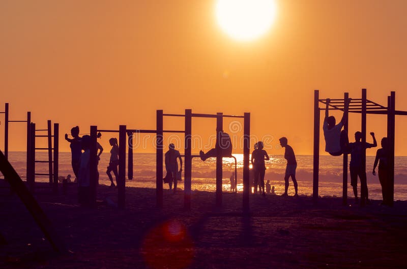 People Exercise on Sunset Wallpaper Stock Photo - Image of wallpaper ...