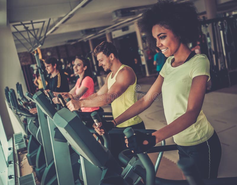 Gym People on Cardio Machines Stock Photo - Image of latinamerican ...