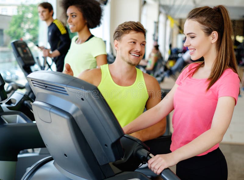People Exercising on a Cardio Training Machines Stock Image - Image of ...