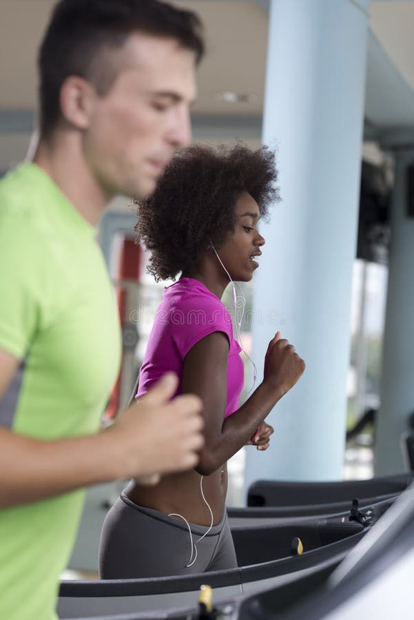 People Exercisinng a Cardio on Treadmill Stock Image - Image of afro ...