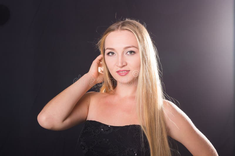 People And Fashion Concept Portrait Of Beautiful Blond Lady Model In