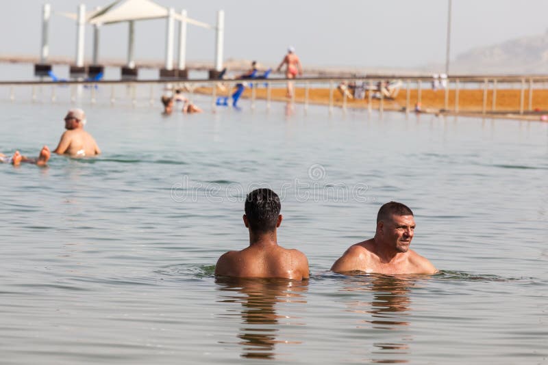 People Floating in Dead Sea Editorial Photography - Image of stone, dead: 166654707