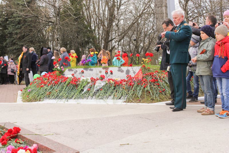 People and Flowers at the Monument. Editorial Photo - Image of memory ...