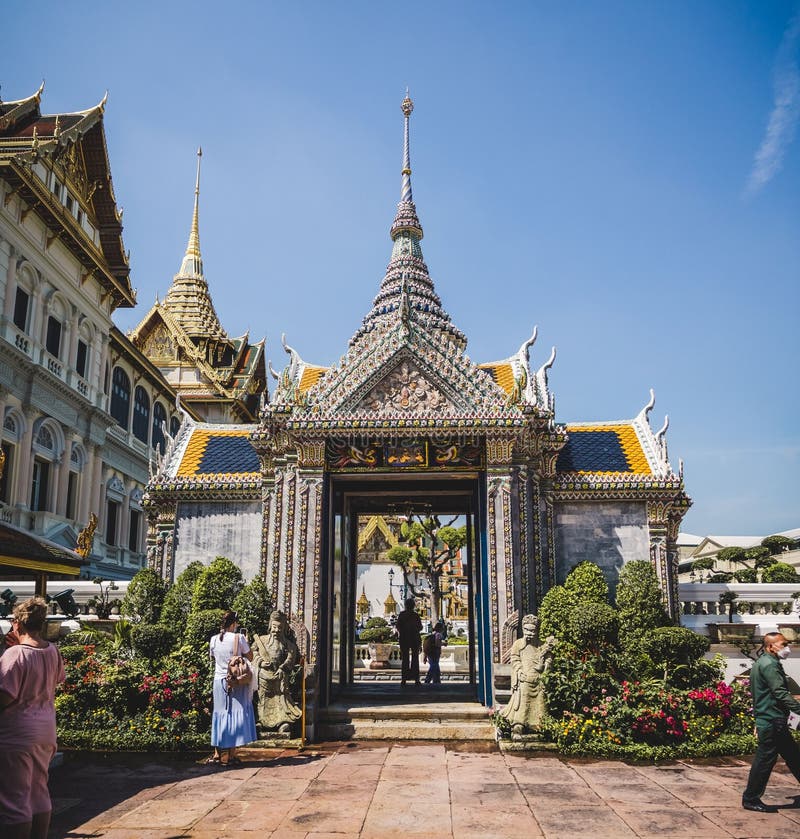 People in Front of an Elaborate, Silver Building at the Grand Palace ...
