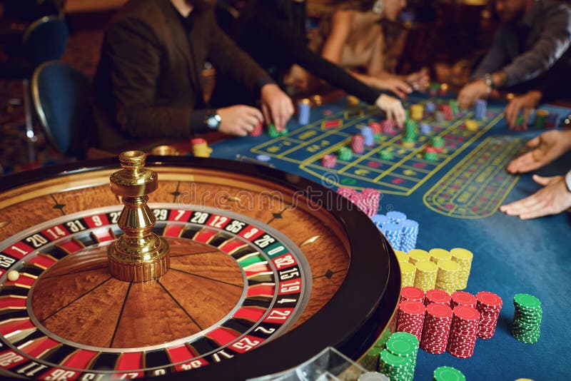 People Gambling at Roulette Poker in a Casino. Stock Photo - Image of ...