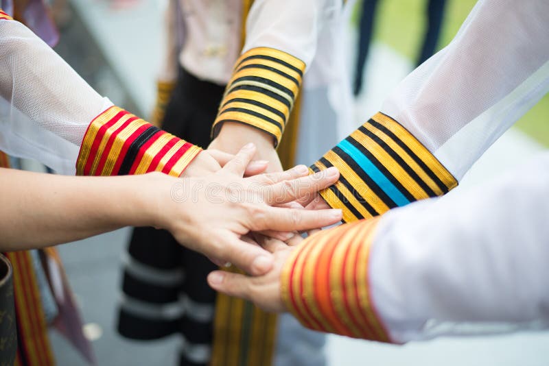 People gather their hands stock photo. Image of union - 61941524