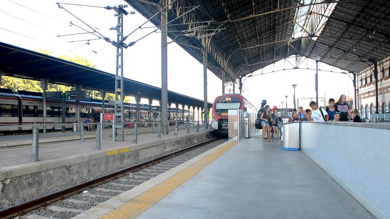 People are Getting Out of the Train Carriage. the Train Has Arrived at ...