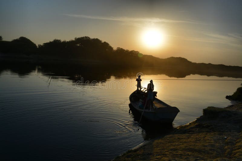 People Go Back Home by Boat Stock Photo - Image of water, lake: 200661086