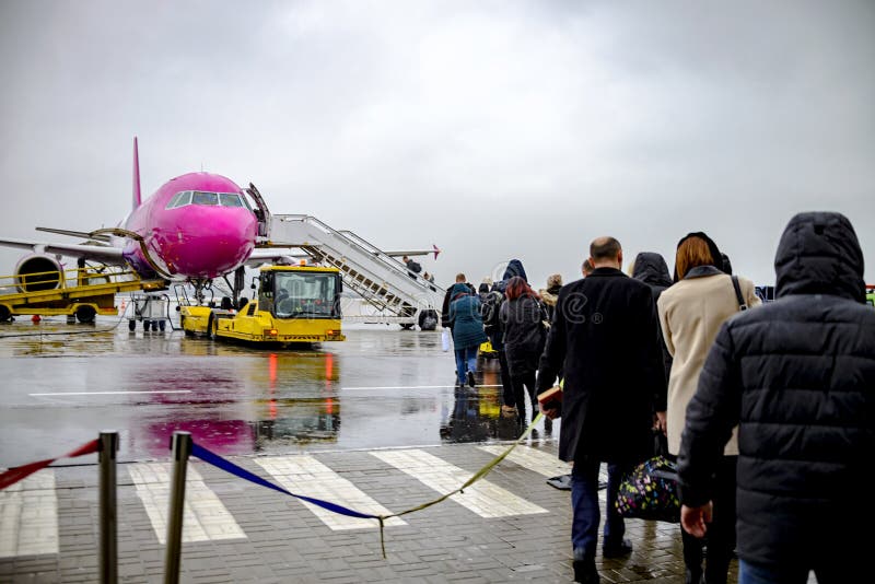 People Go on Boarding a Plane Editorial Image - Image of plane, lamp ...