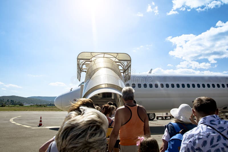 People Go on Boarding a Plane Editorial Stock Image - Image of suitcase ...