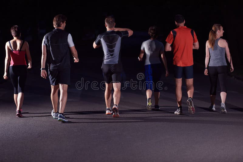 People Group Jogging at Night Stock Photo - Image of girl, adult: 60696258