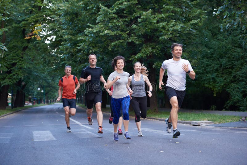 People group jogging stock image. Image of flare, athlete - 60697397