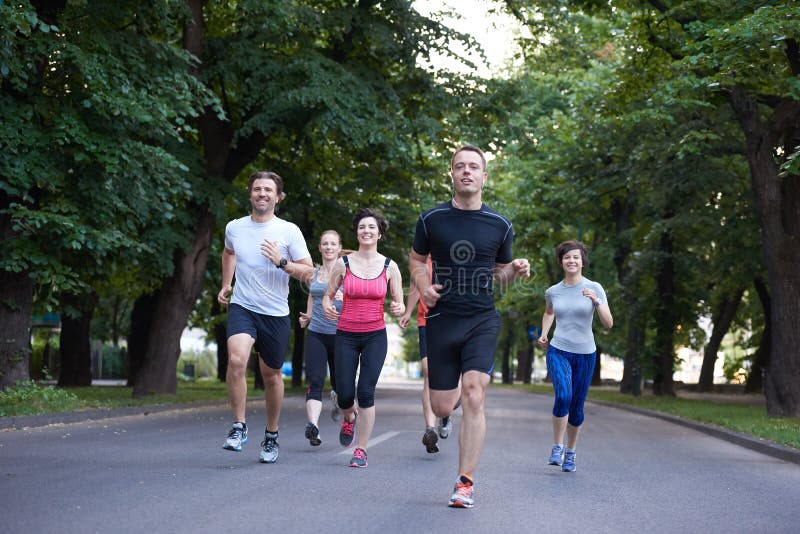 People group jogging stock photo. Image of person, friends - 60834362