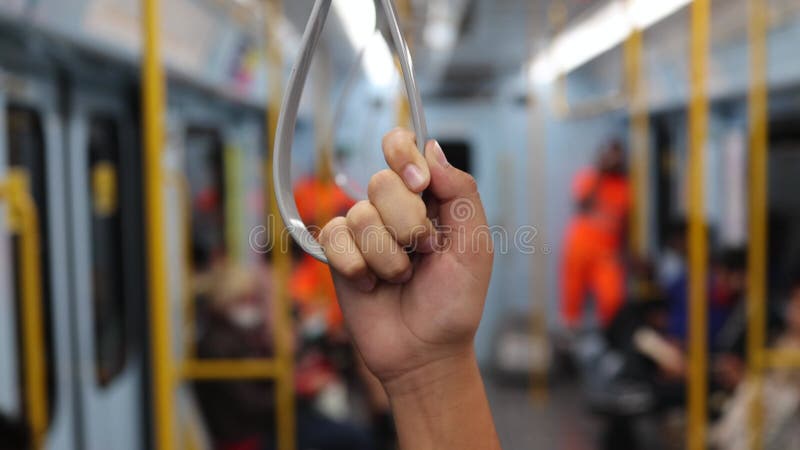 People Hand Holding Handle on the Train. Clipping Path. Stock Footage ...