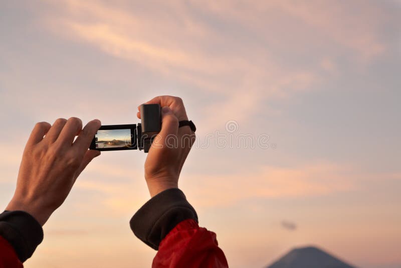 People hand taking picture stock photo. Image of scenery - 16386728