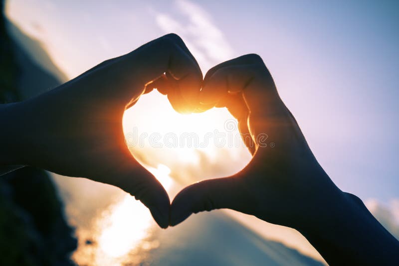 Woman Hands Making Heart Shape Stock Photo - Image of heart, sunrise ...