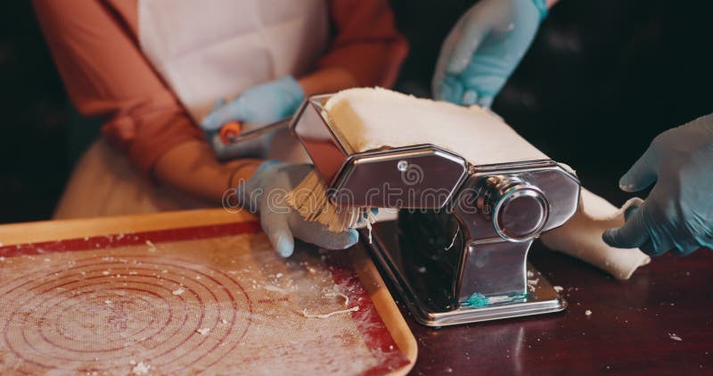 People, Hands and Pasta Machine in Class for Cooking, Learning and Help ...