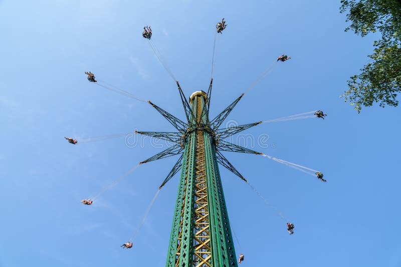 People Having Fun in Carousel Swing Ride Stock Photo - Image of happy ...