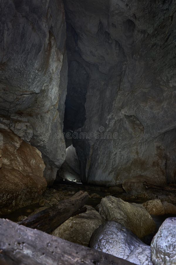 People with Headlamps Exploring a Cave Stock Image - Image of outdoor ...