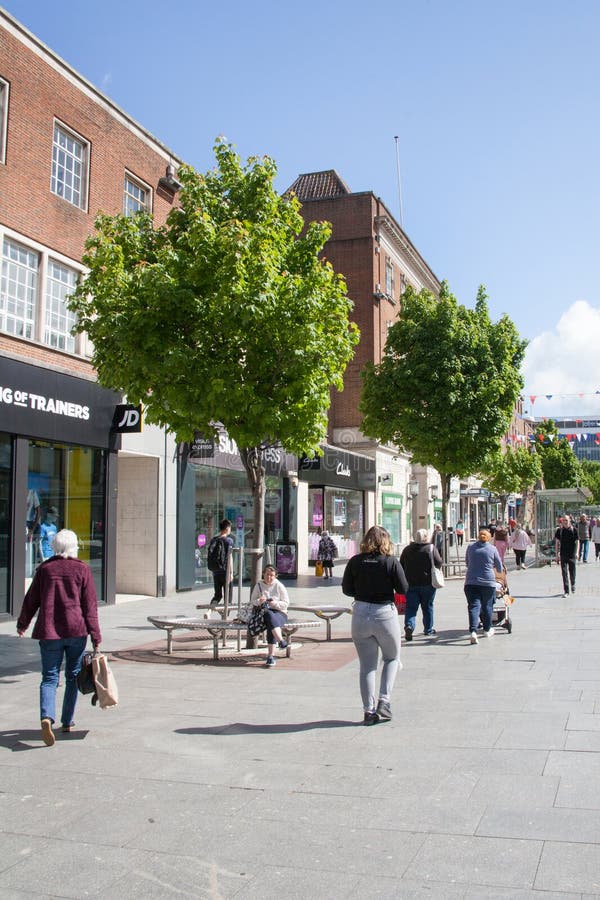 People on the High Street in Exeter, Devon in the UK Editorial Image ...