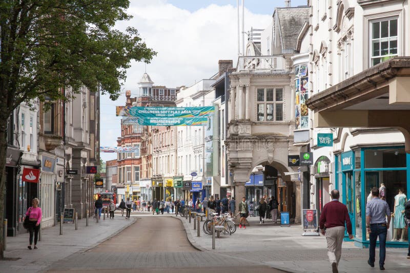 People on the High Street in Exeter, Devon in the UK Editorial Image ...