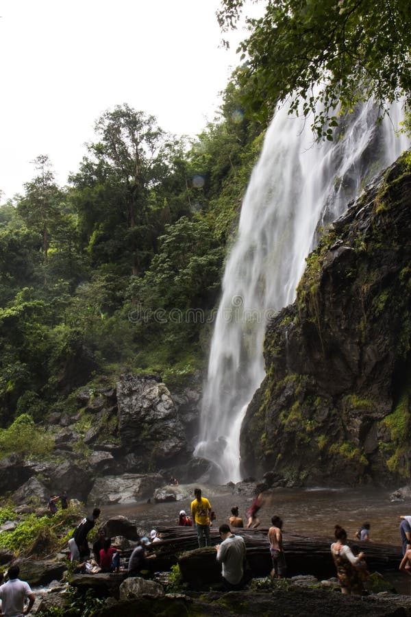People with High Waterfall. Stock Image - Image of island, people: 82766049
