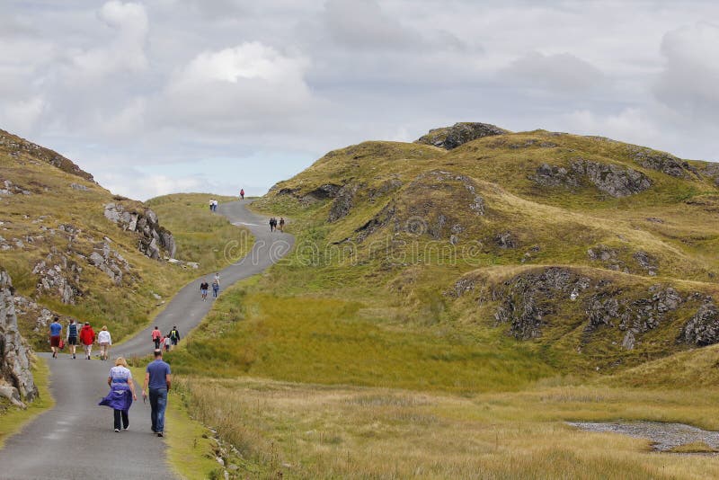 People hiking in Ireland stock photo. Image of hill, sinuous - 62461830